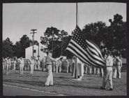 Photograph of Air Force ROTC cadets raising/lowering the American flag ...
